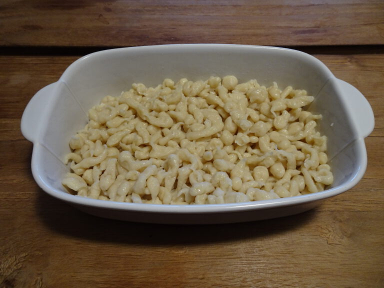 Authentic German Spätzle (engl. spaetzle) with mushroom cream sauce